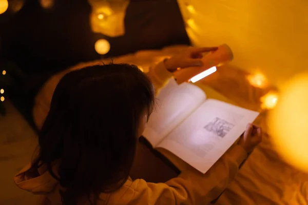 Young Female Child Reading Encyclopedia Home Made Livingroom Tent Light ...