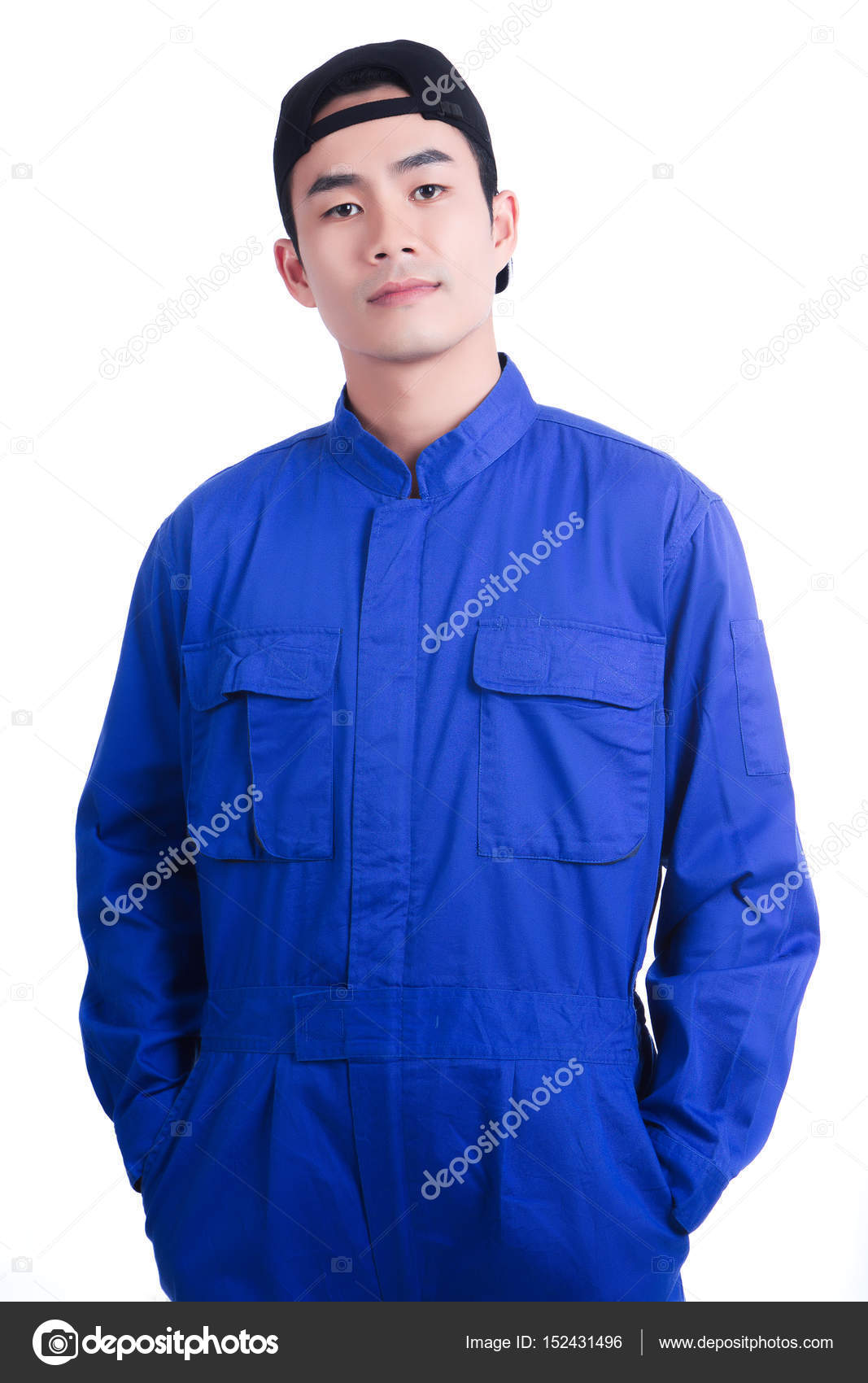 Man in blue uniform suit wearing a hat and pose acting in portra Stock ...