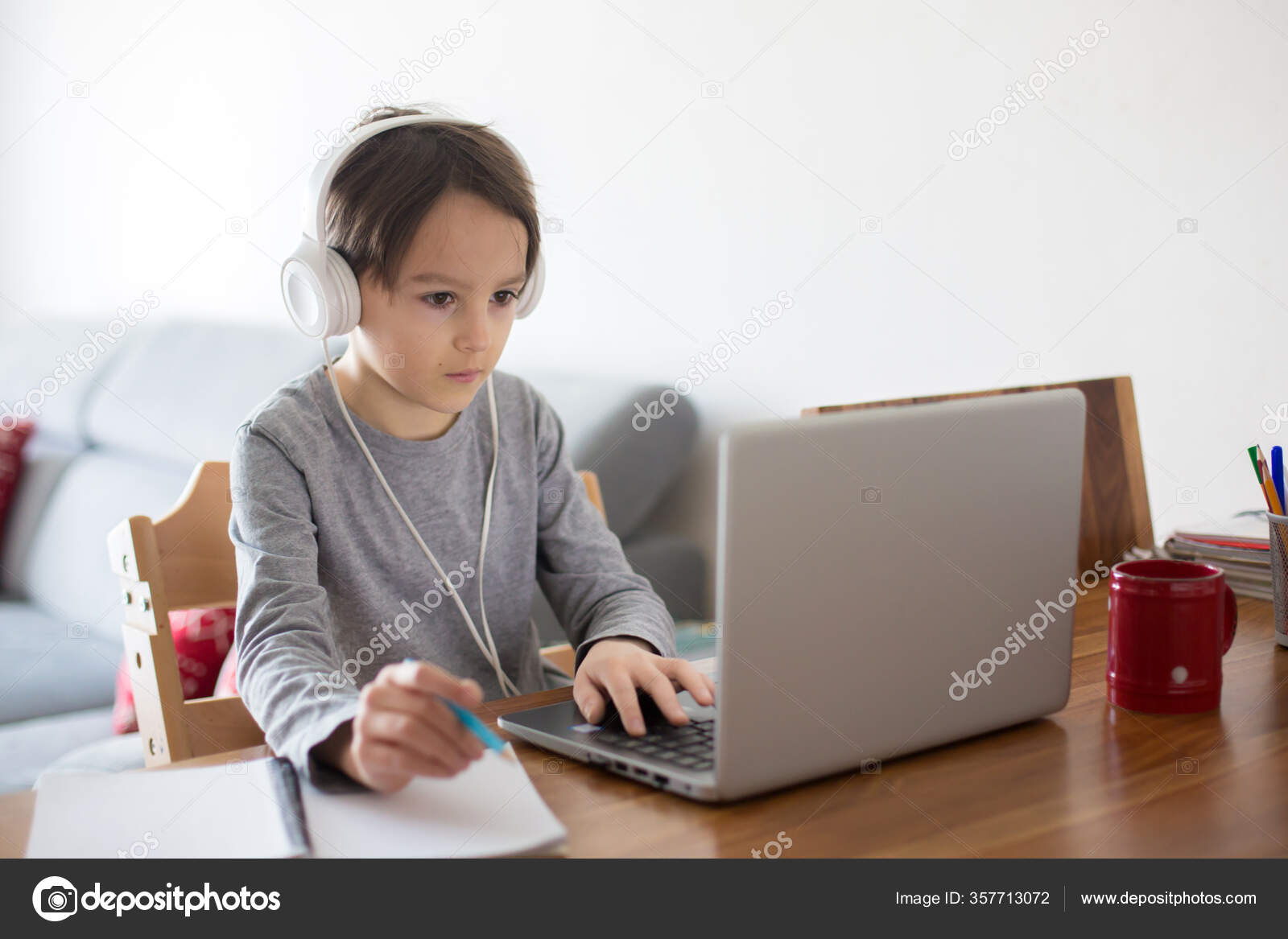 School Child Sitting Table Laptop Writing School Tasks While ...