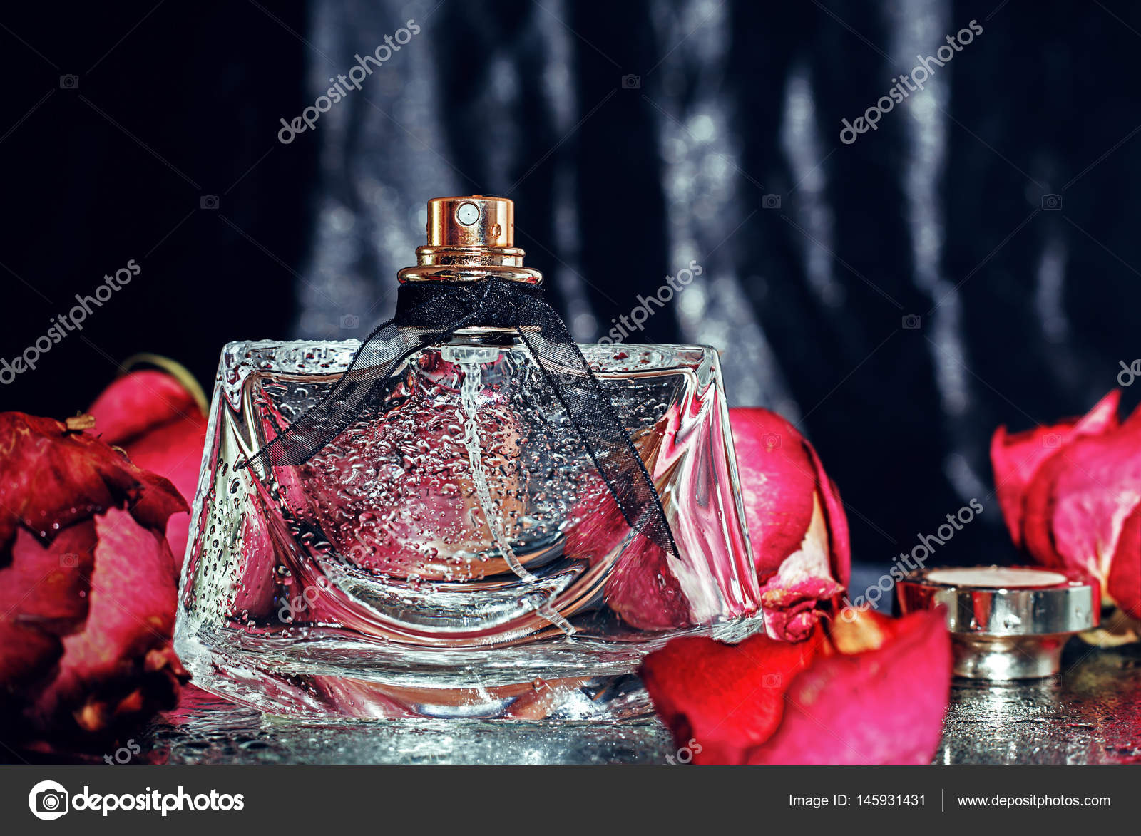 Perfume bottle and pink roses Stock Photo by ©Martyna1802 145931431