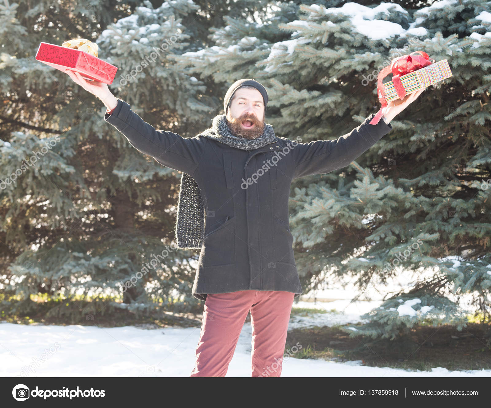 Happy man with gift boxes Stock Photo by ©stetsik 137859918