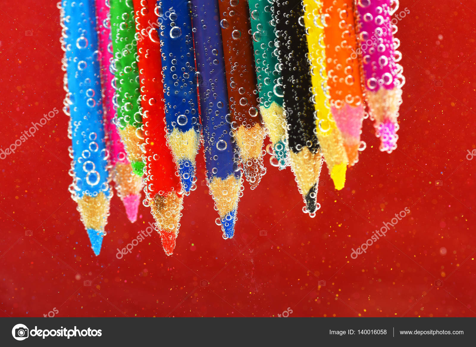 Colored pencils in sparkling water Stock Photo by ©stetsik 140016058