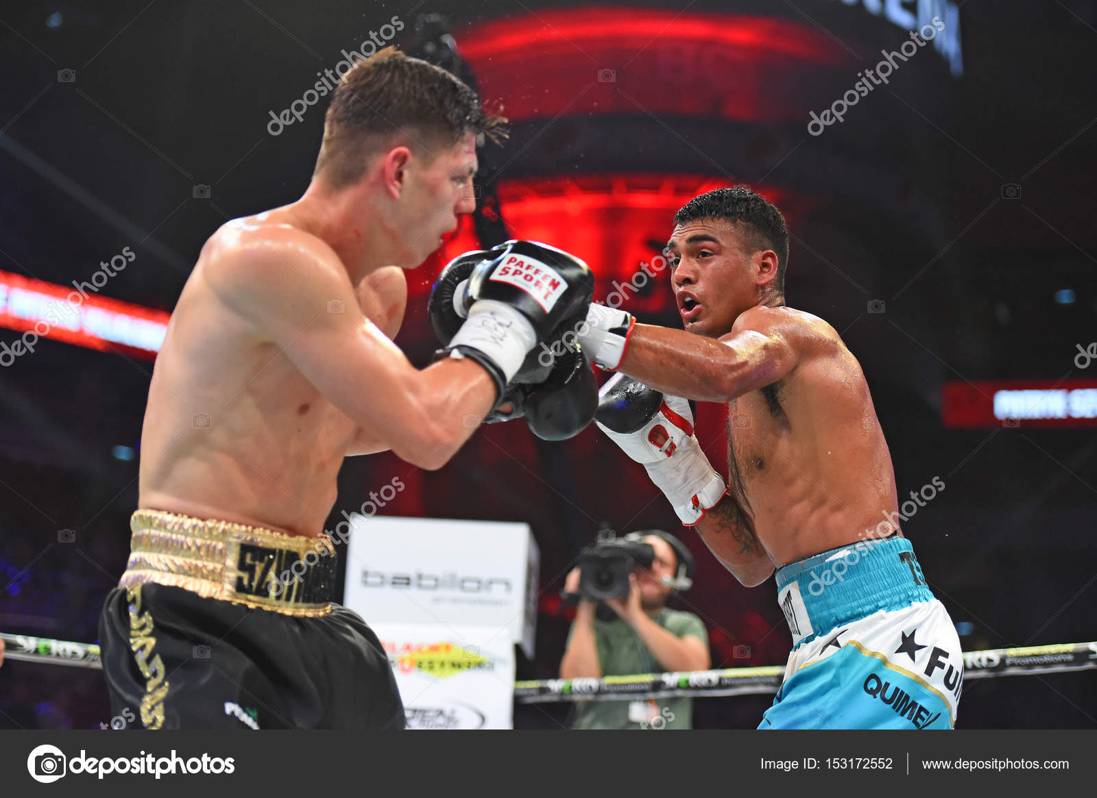 An unidentified boxers in the ring during fight for ranking points ...