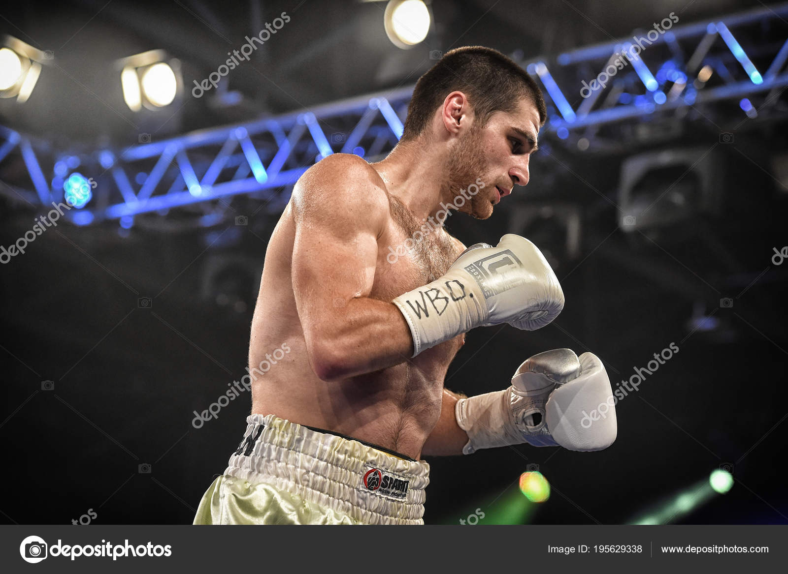 An unidentified boxers in the ring during fight for ranking points ...