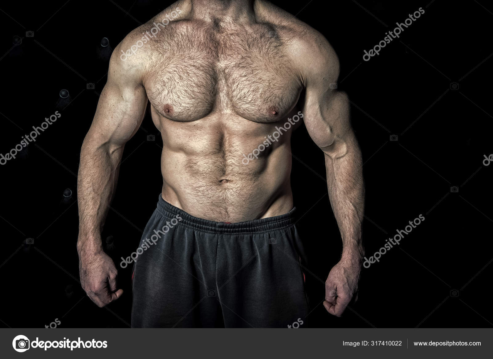 Perfect look. Torso with six packs looks attractive on black background ...
