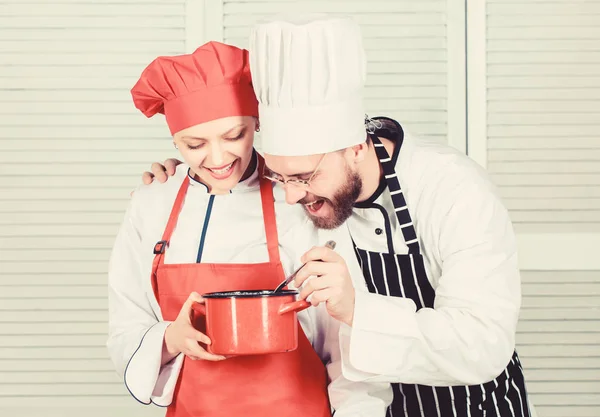 Need some help. Family cooking in kitchen. couple in love with perfect ...