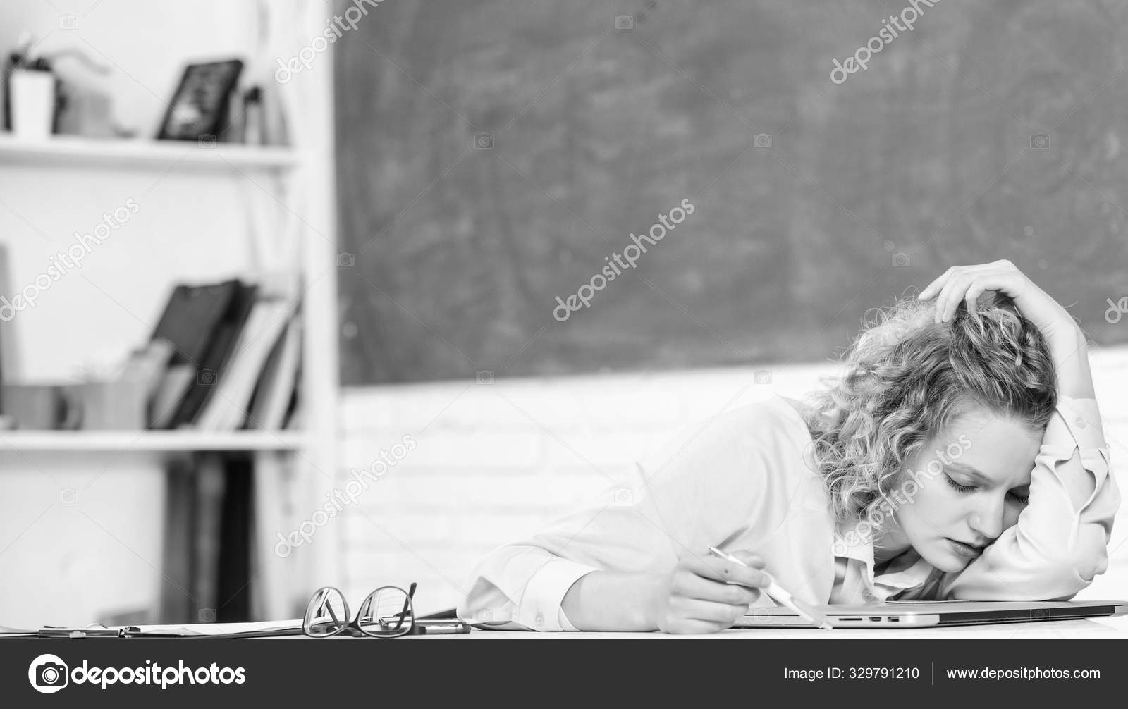Tired tutor fall asleep at workplace. Tired student lean on desk ...