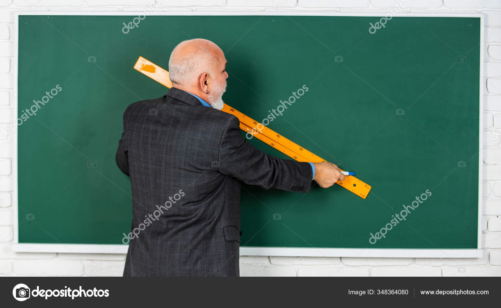 Senior man teacher use ruler while drawing. bearded tutor man draw with ...