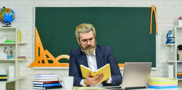 Digital technology. School teacher with laptop. Web development ...