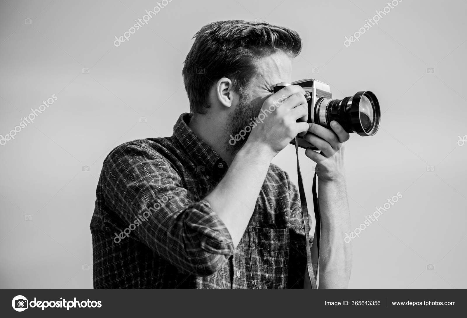 Guy outdoors blue sky background. Handsome blogger guy traveler retro ...