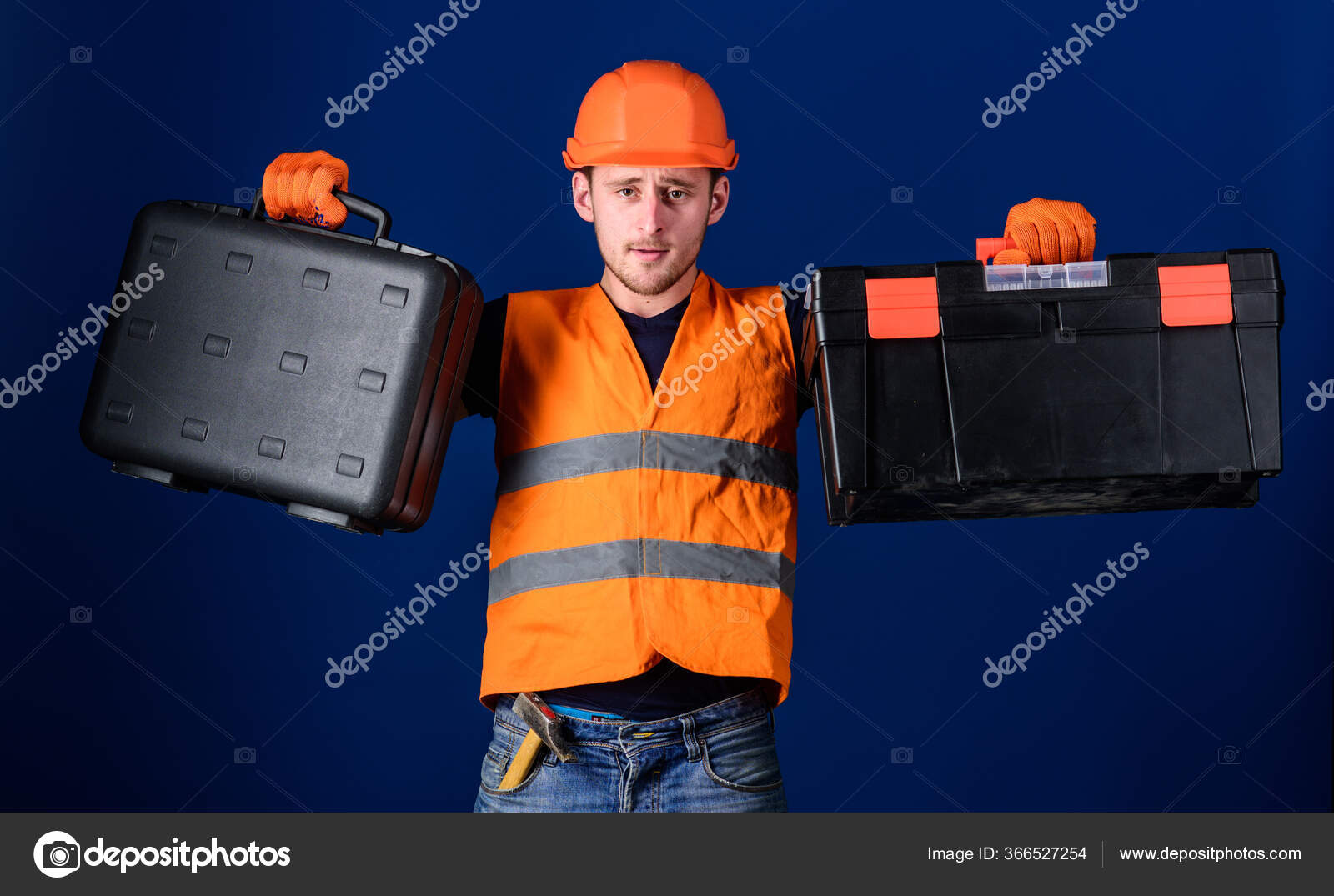 Toolbox and equipment concept. Man in helmet, hard hat holds toolbox ...