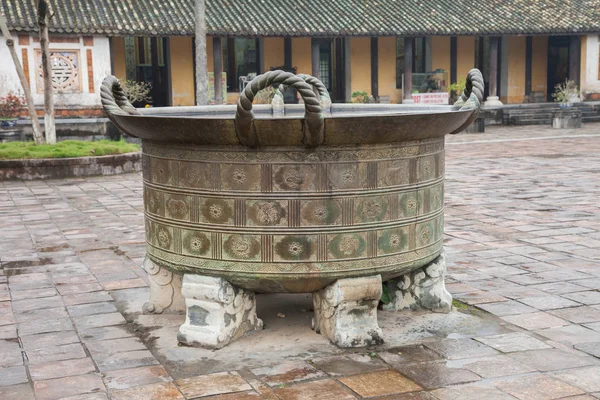 Vietnam, Hue. Ancient bronze container from the 17th century decorated ...