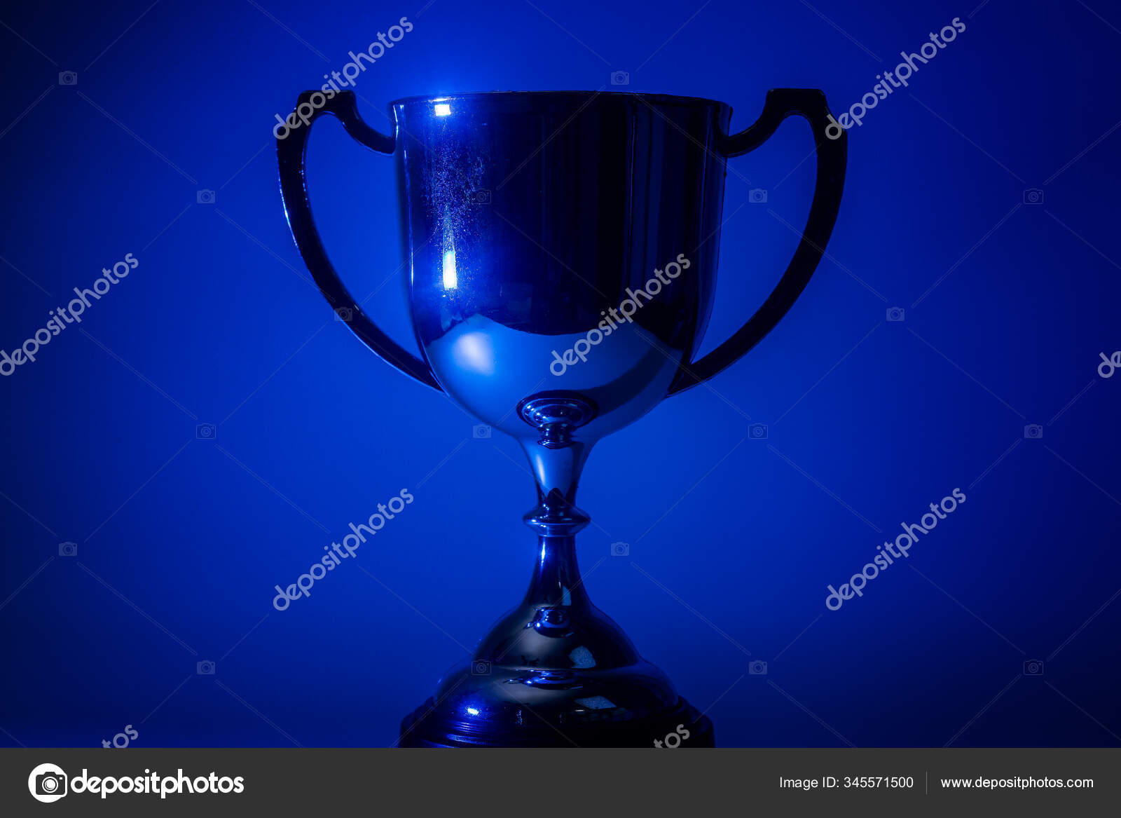 Winner Trophy Creative Lighting — Stock Photo © hafiz.ismail #345571500