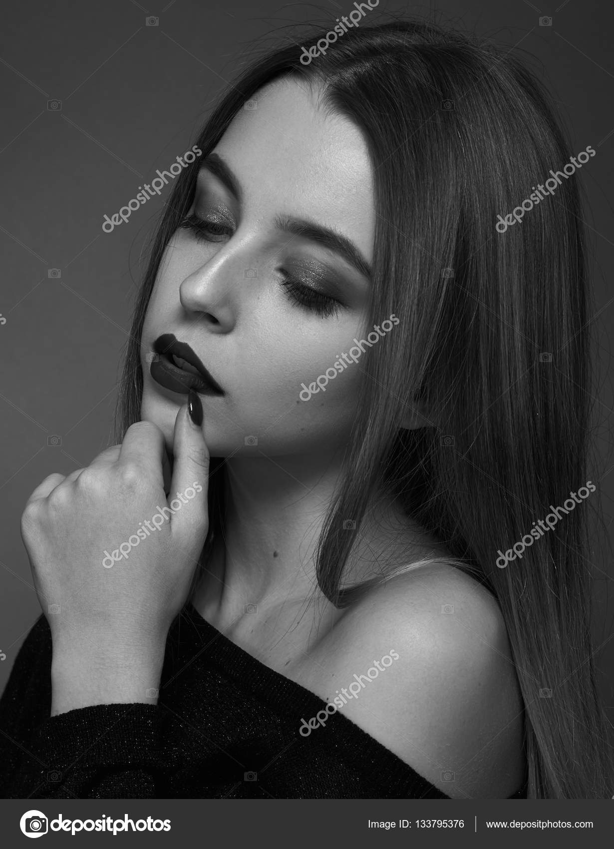 Dramatic Black And White Portrait Of A Beautiful Girl On A Dark