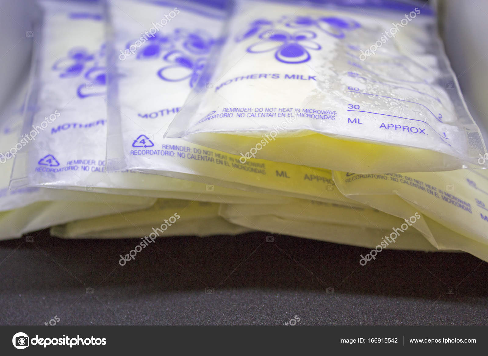 Pumped frozen breastmilk for feeding baby Stock Photo by ©Nata_BU 166915542