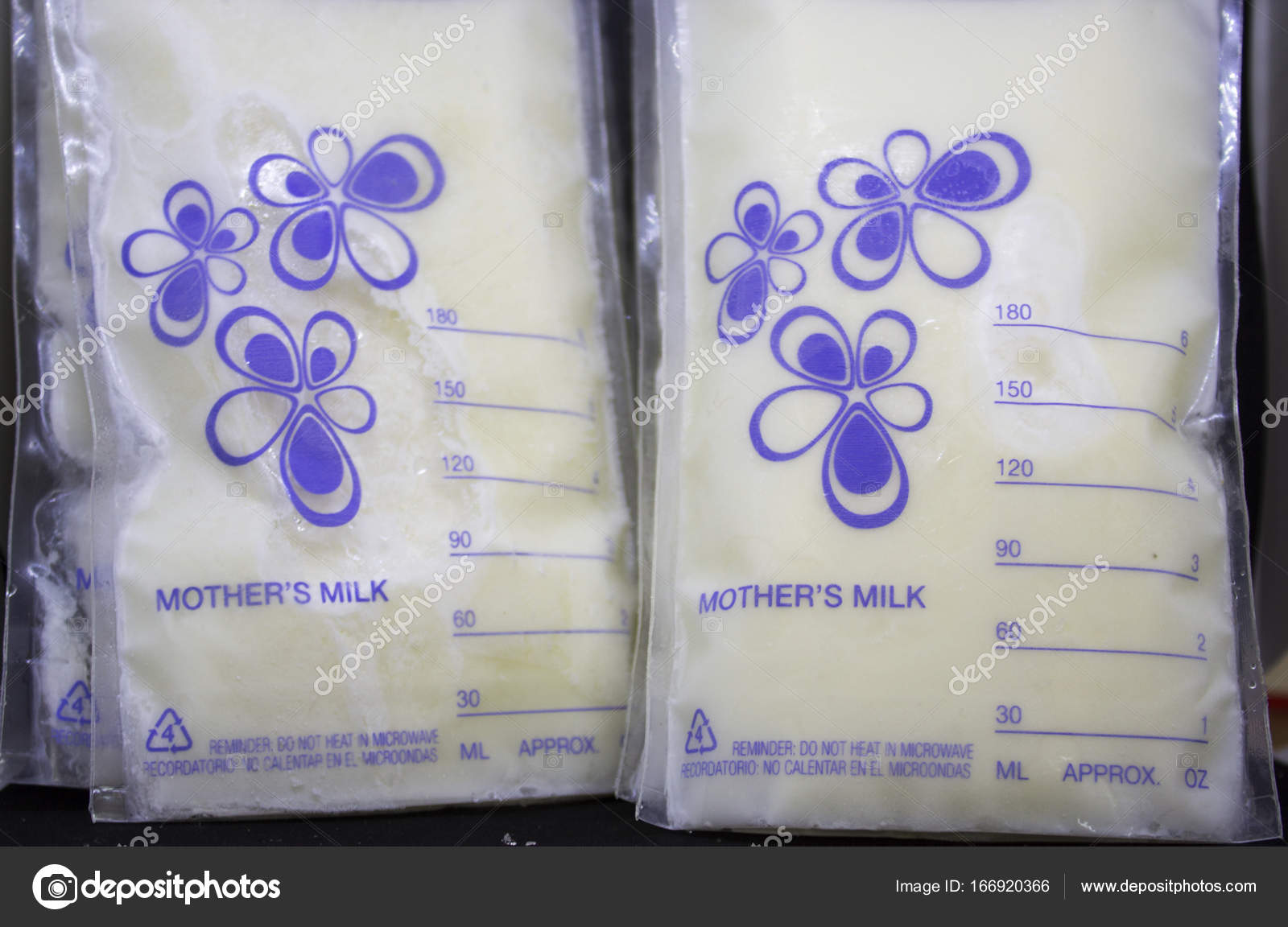 Pumped frozen breastmilk for feeding baby Stock Photo by ©Nata_BU 166920366