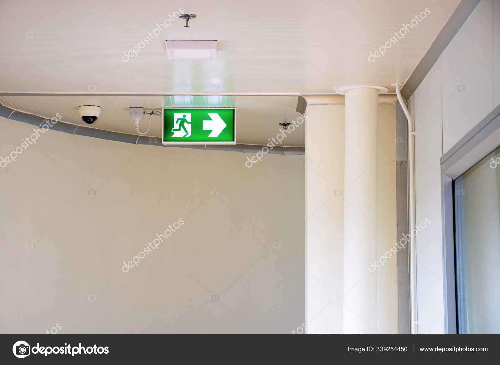 Emergency fire exit sign show the way to escape. — Stock Photo ...