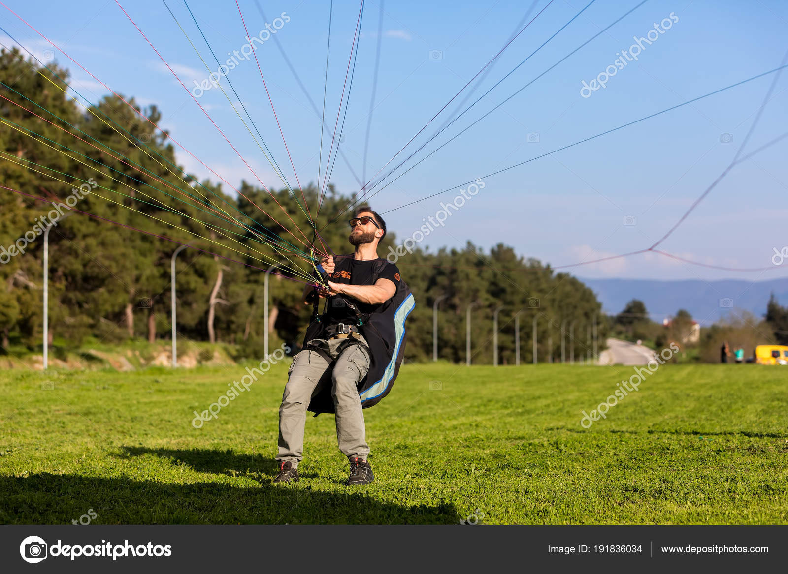 Man is trained on a paragliding flight – Stock Editorial Photo © vverve ...
