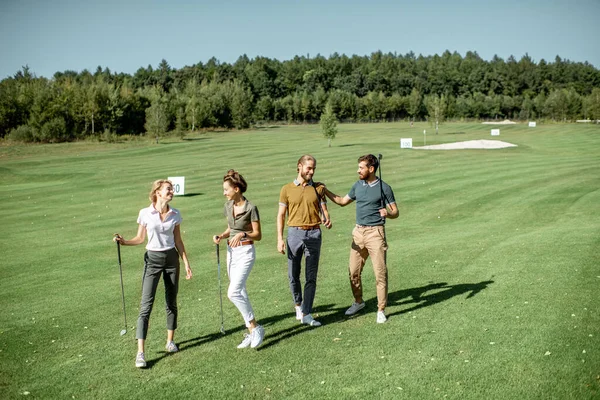 Friends on the golf course - Stock Image - Everypixel
