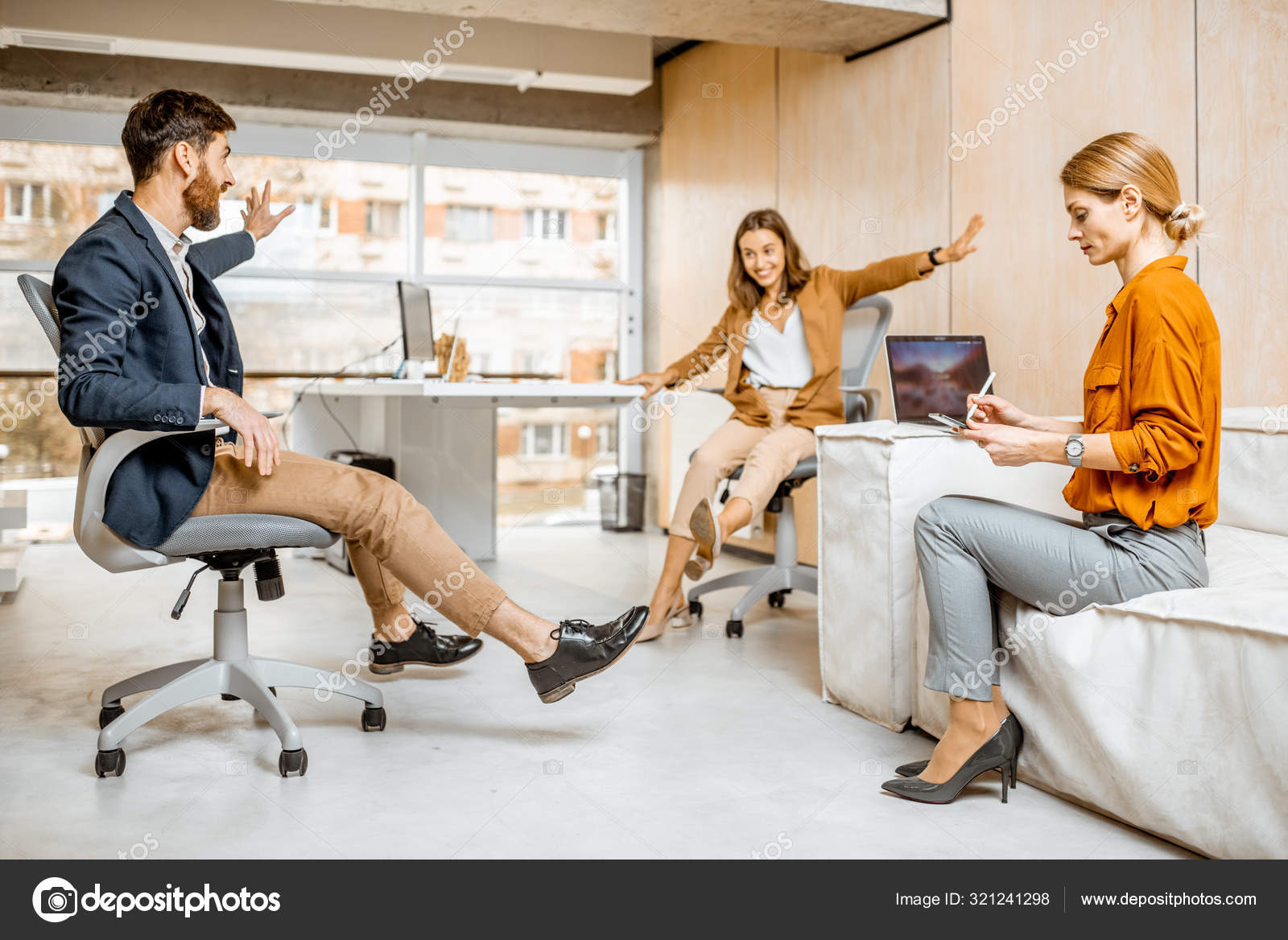Playful employees having fun in the office — Stock Photo © rossandhelen ...