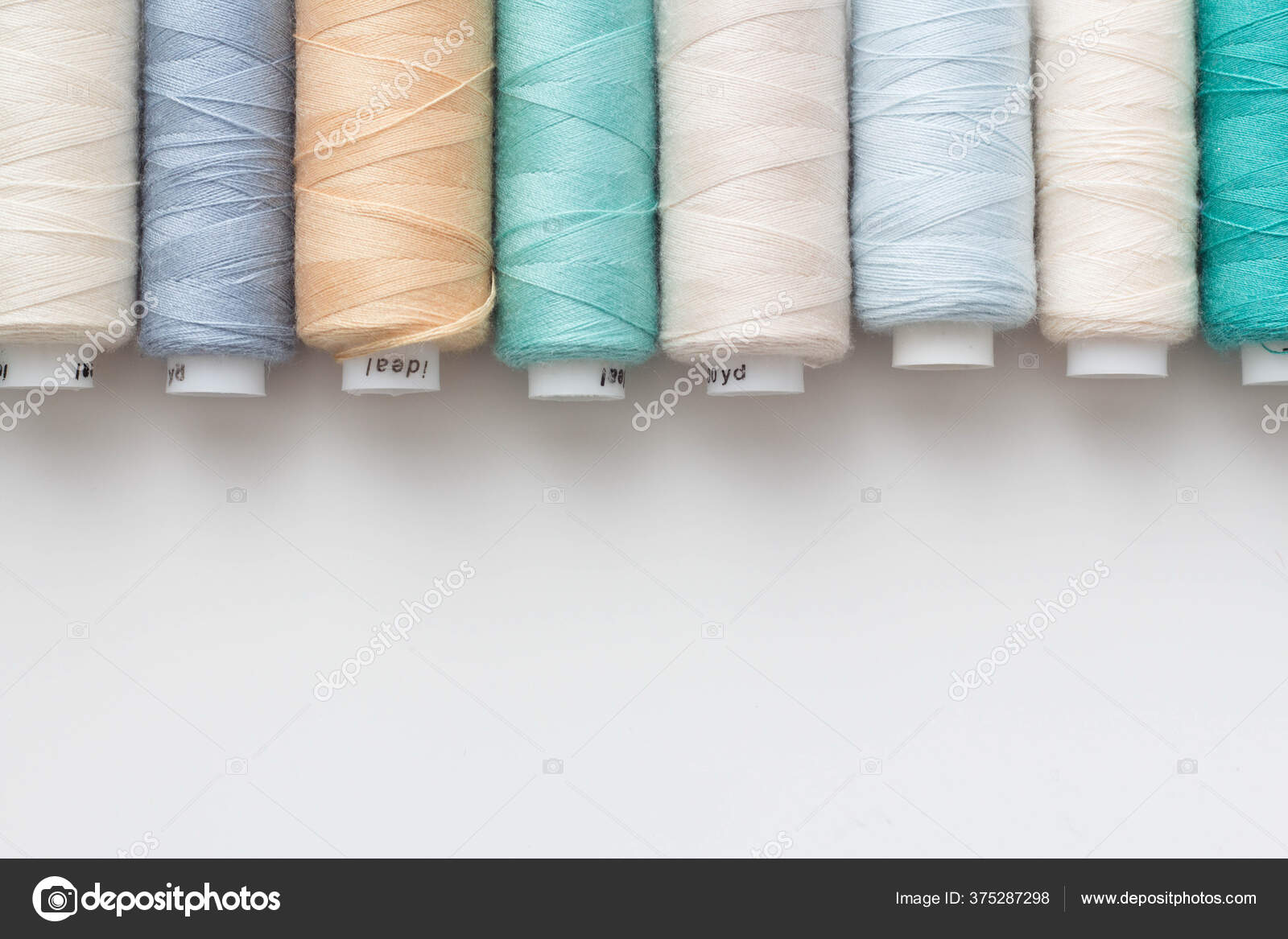 Color sewing threads on white background ⬇ Stock Photo, Image by ...