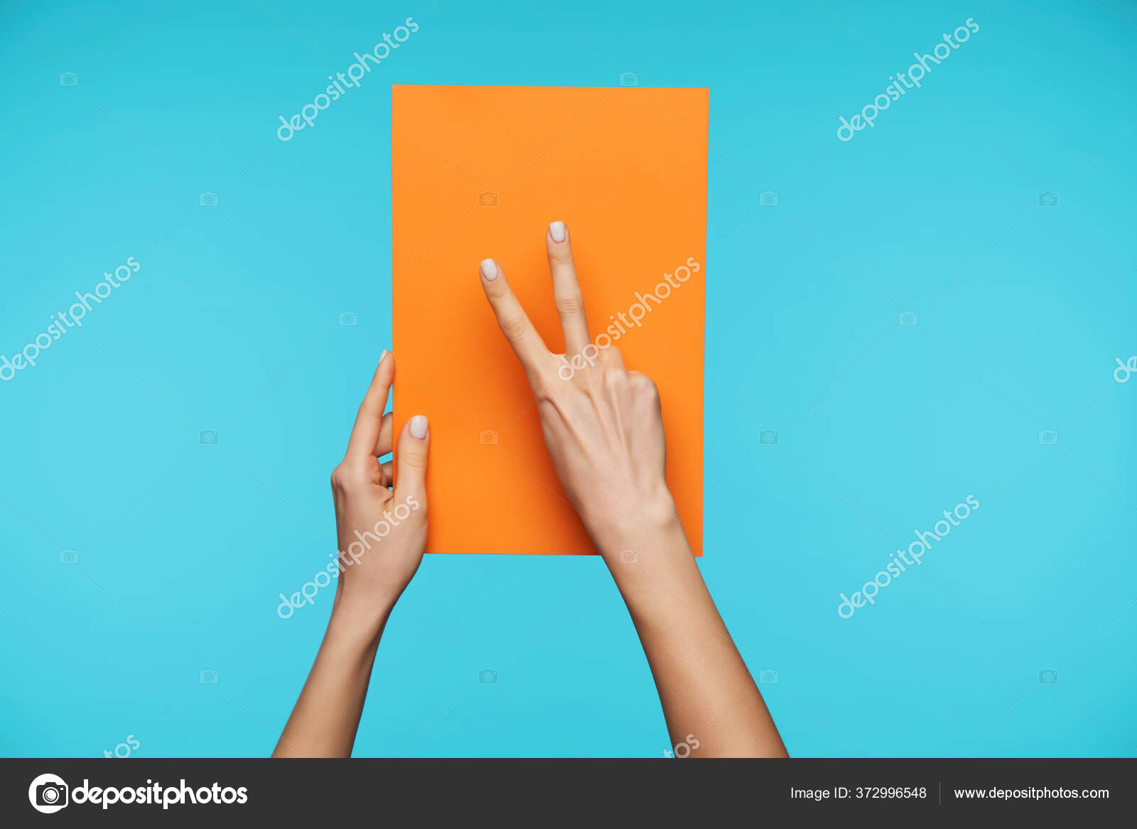 Two Beautiful Woman's Hands Being Raised While Holding Paper Format ...