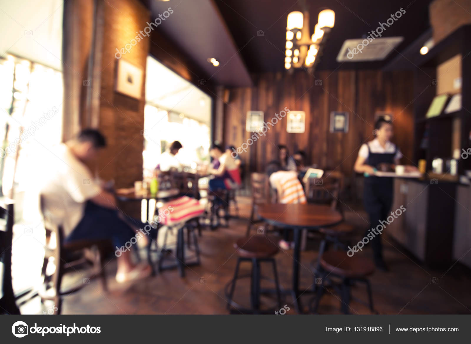 Coffee shop - cafe blurred background Stock Photo by ©jakkapan 131918896