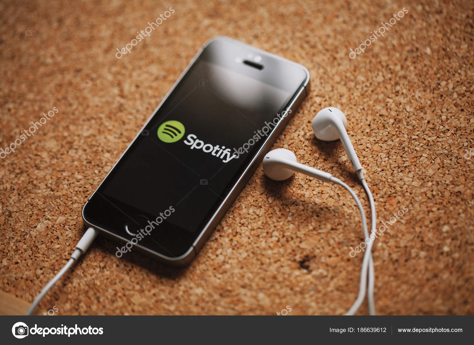 MALAGA, SPAIN - MARCH 5, 2018: Mobile phone with Spotify logo in the ...