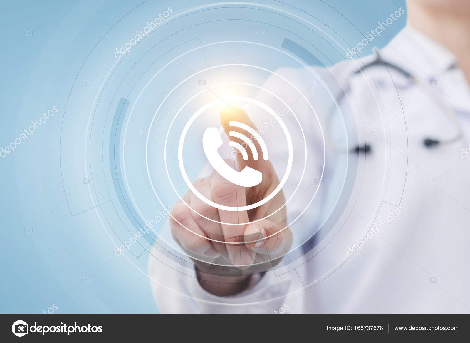 Doctor presses the call button. Stock Photo by ©NataliMis 165737678
