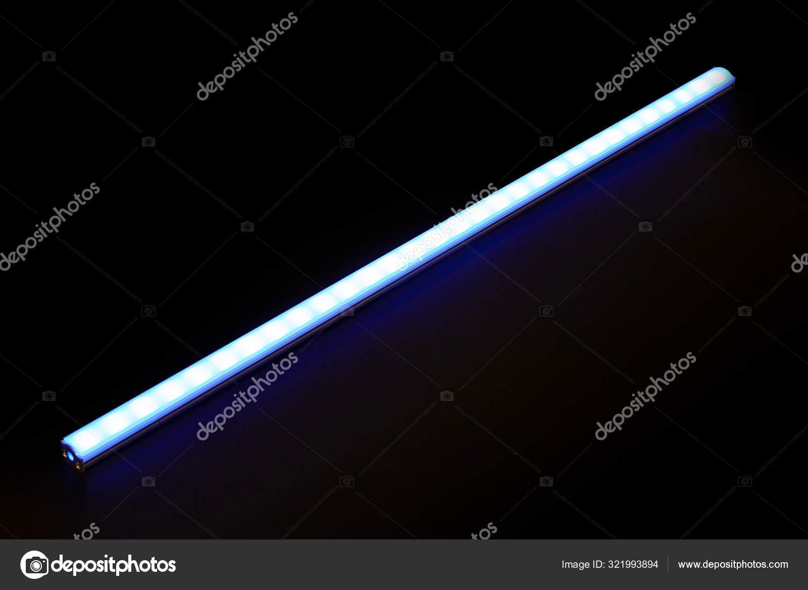 Glowing blue led light bar on black background. — Stock Photo ...