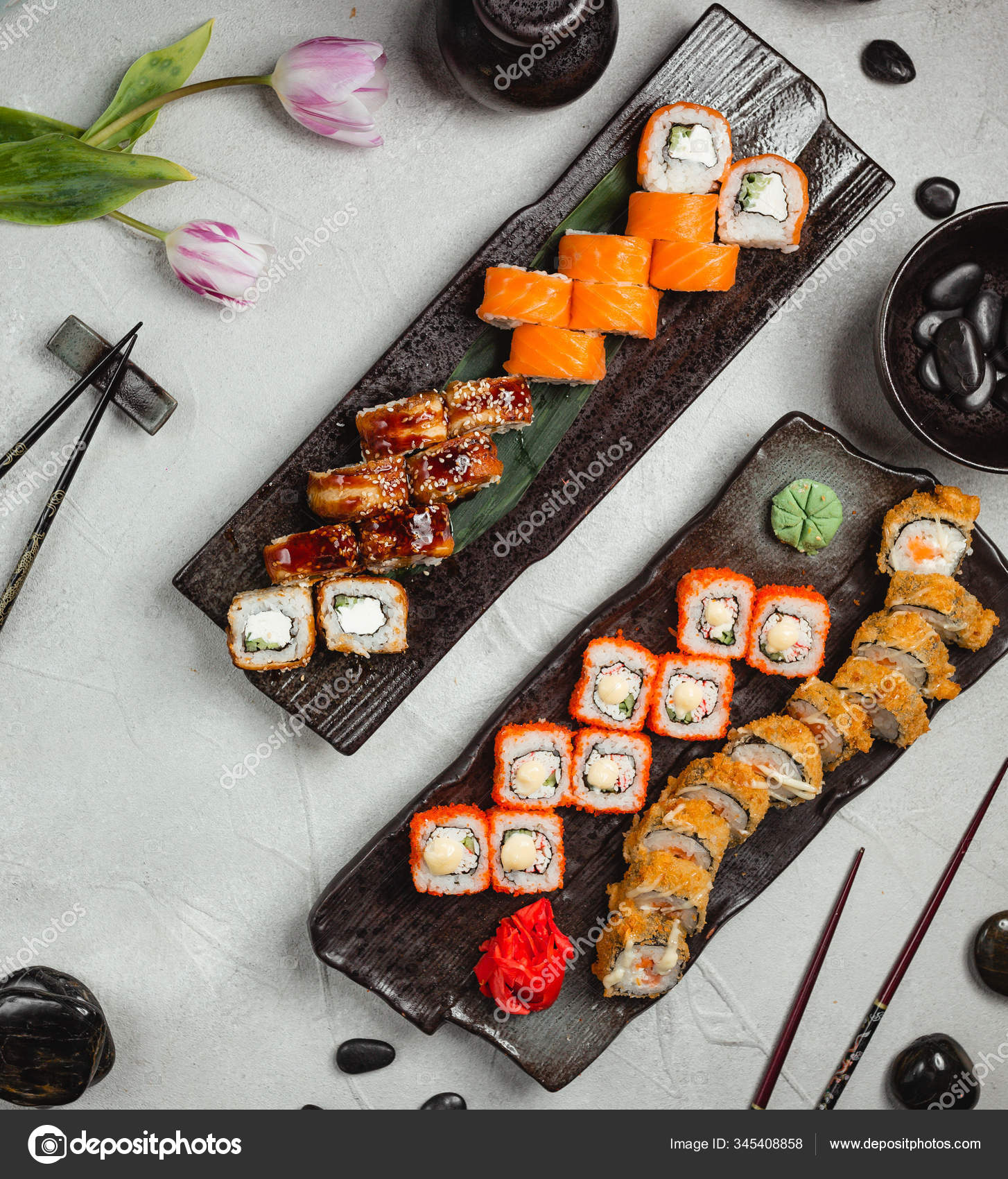 Various sushi sets top view — Free Stock Photo © kamranaydinov #345408858