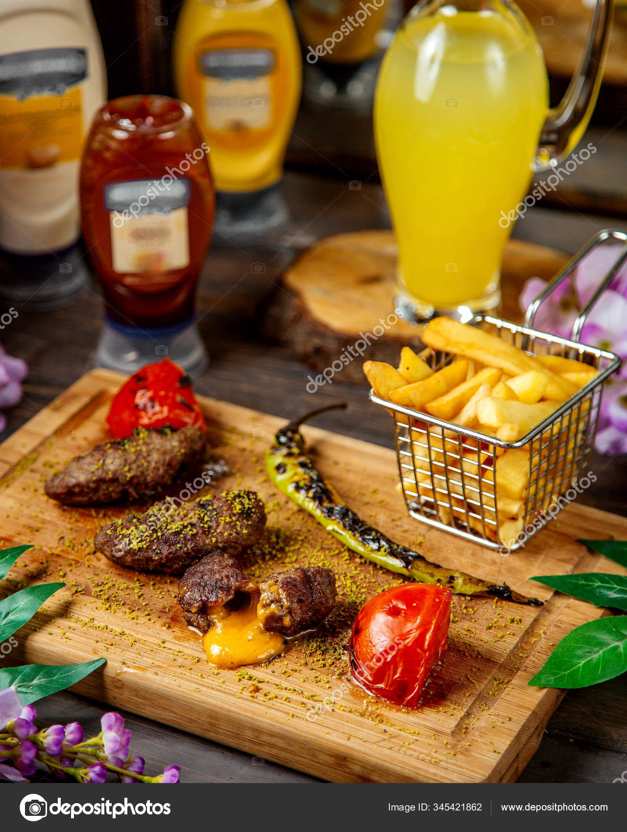 Lamb kebab stuffed with cheddar cheese served with french fries grilled ...