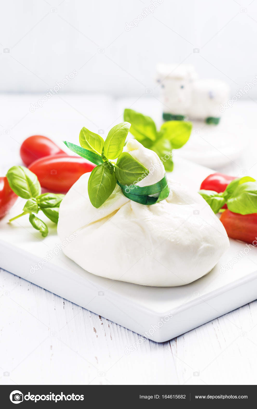 Italian burrata cheese Stock Photo by ©laroinovaolga 164615682