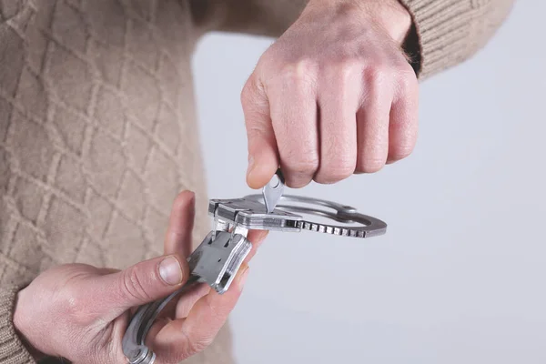 Man hand handcuffs Stock Photo by ©vadimaramyan@gmail.com 319618406