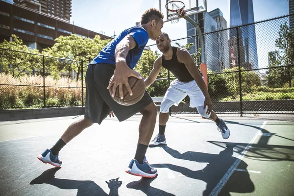 Basketball players training on court - Stock Image - Everypixel