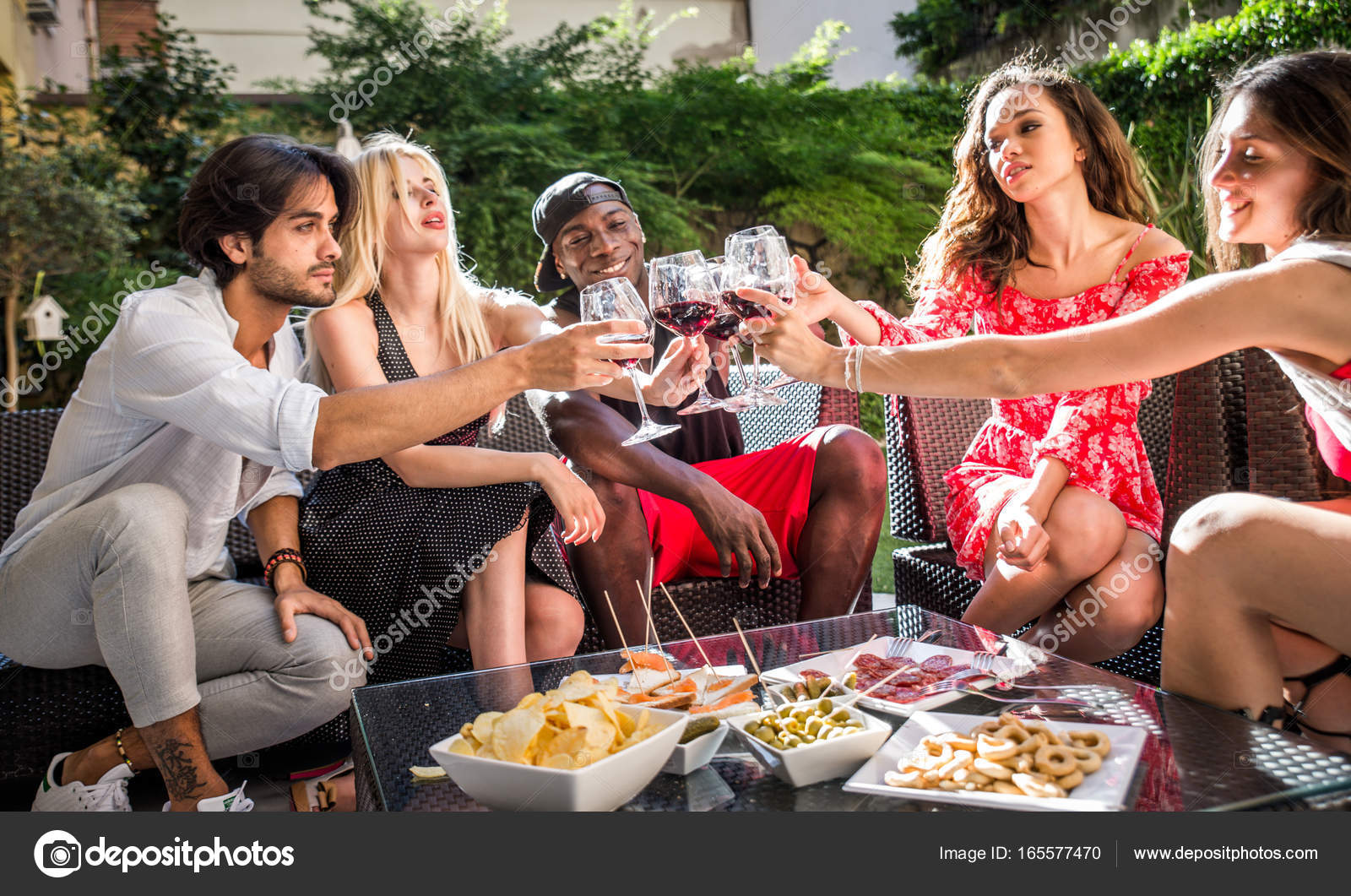 Friends having party — Stock Photo © oneinchpunch #165577470