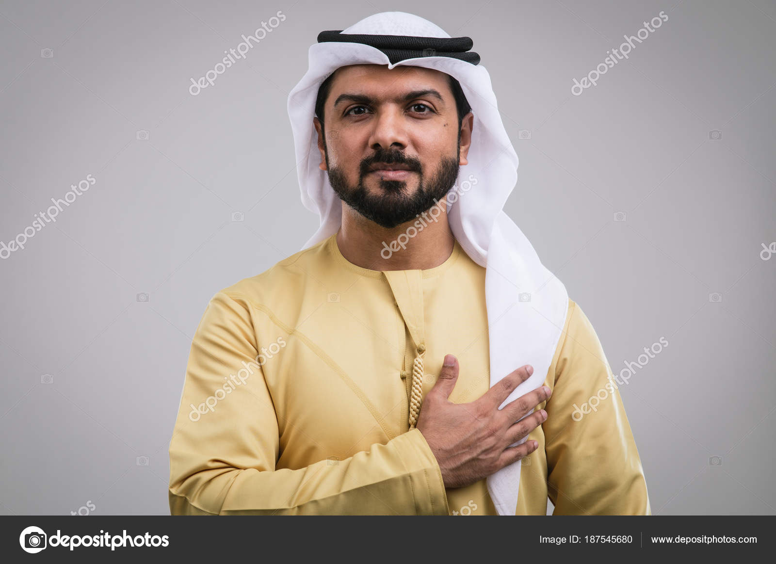 Arabic handsome man studio portraits — Stock Photo © oneinchpunch ...