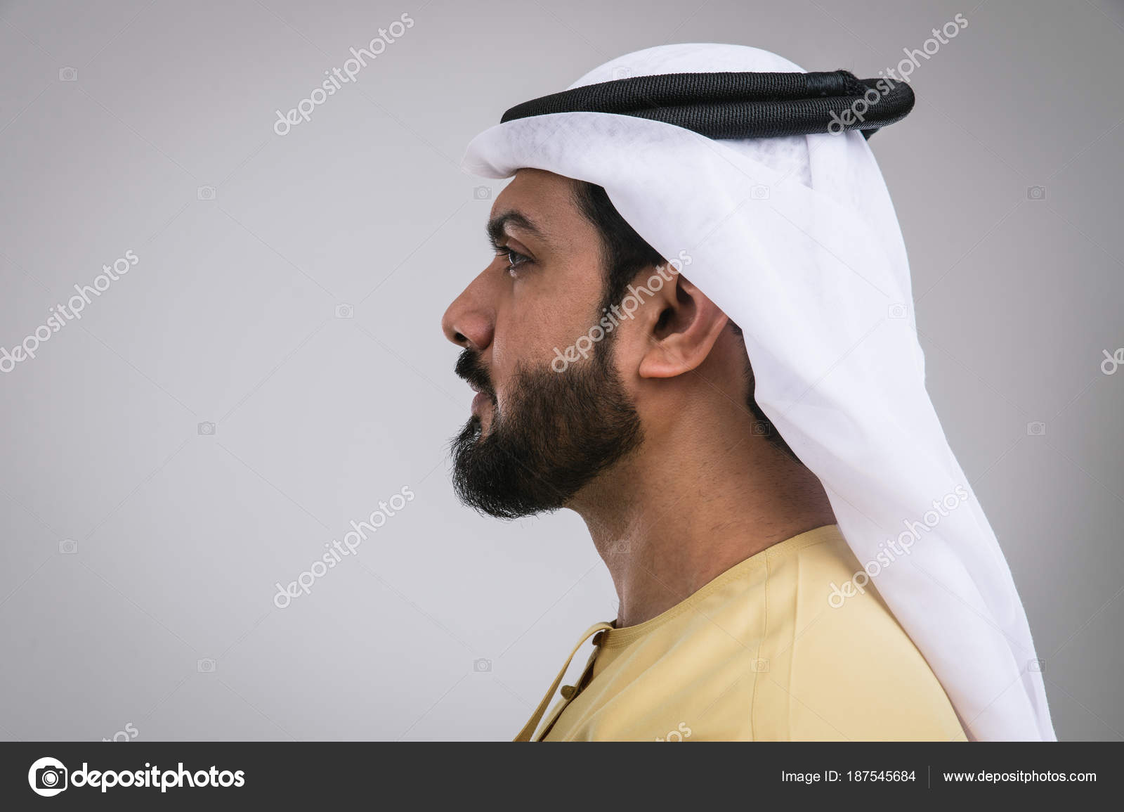 Arabic handsome man studio portraits — Stock Photo © oneinchpunch ...