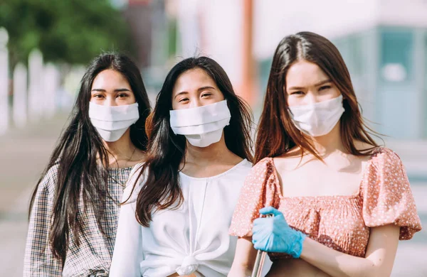 Group of asian girls going out after quarantine during coronavirus ...