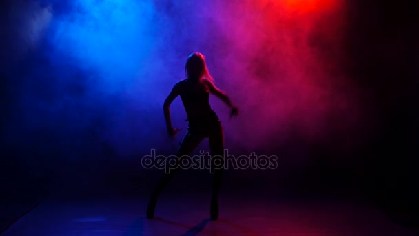 Sexy of go-go dancer performing on stage in bright lights Stock Video ...