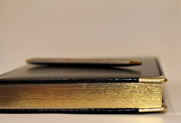 Bible with pen Stock Photos, Royalty Free Bible with pen Images ...