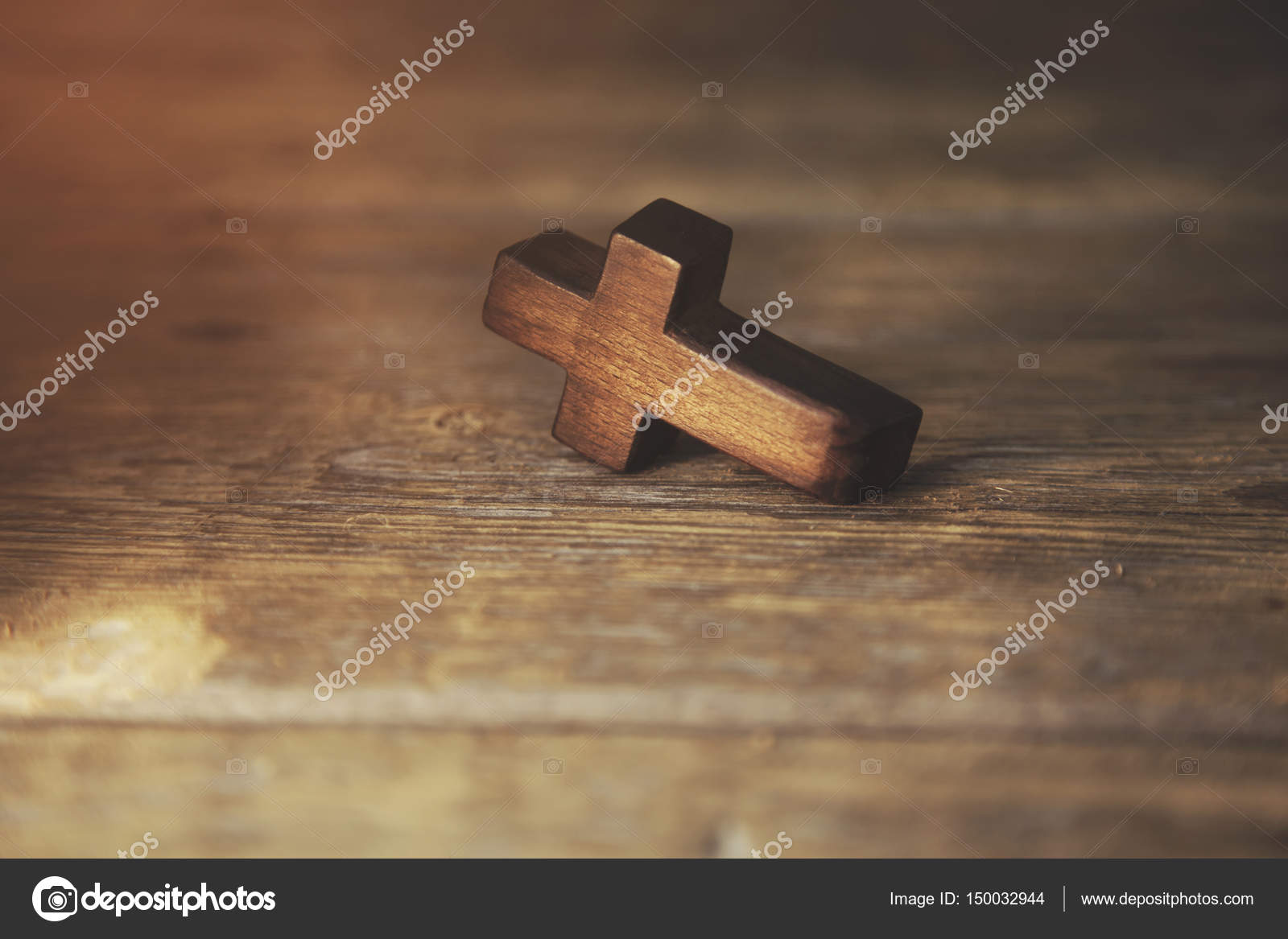 Cross on table Stock Photo by ©Tiko0305 150032944