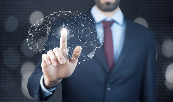 young businessman touching human brain - Stock Image - Everypixel