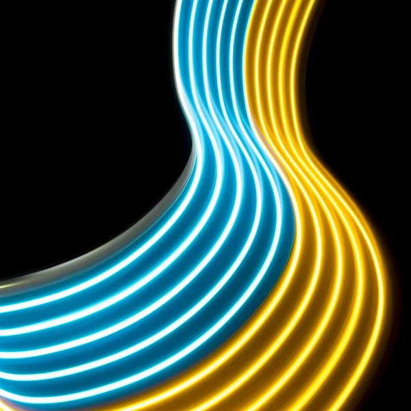 Yellow and blue light curve lines on a black background - Stock Image ...