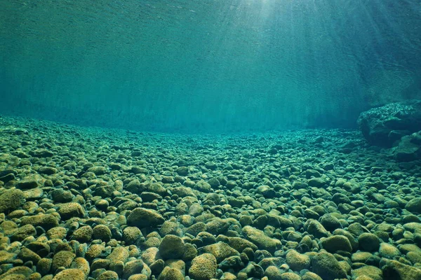 Underwater pebbles and rocks below water surface Stock Photo by ©wildam ...