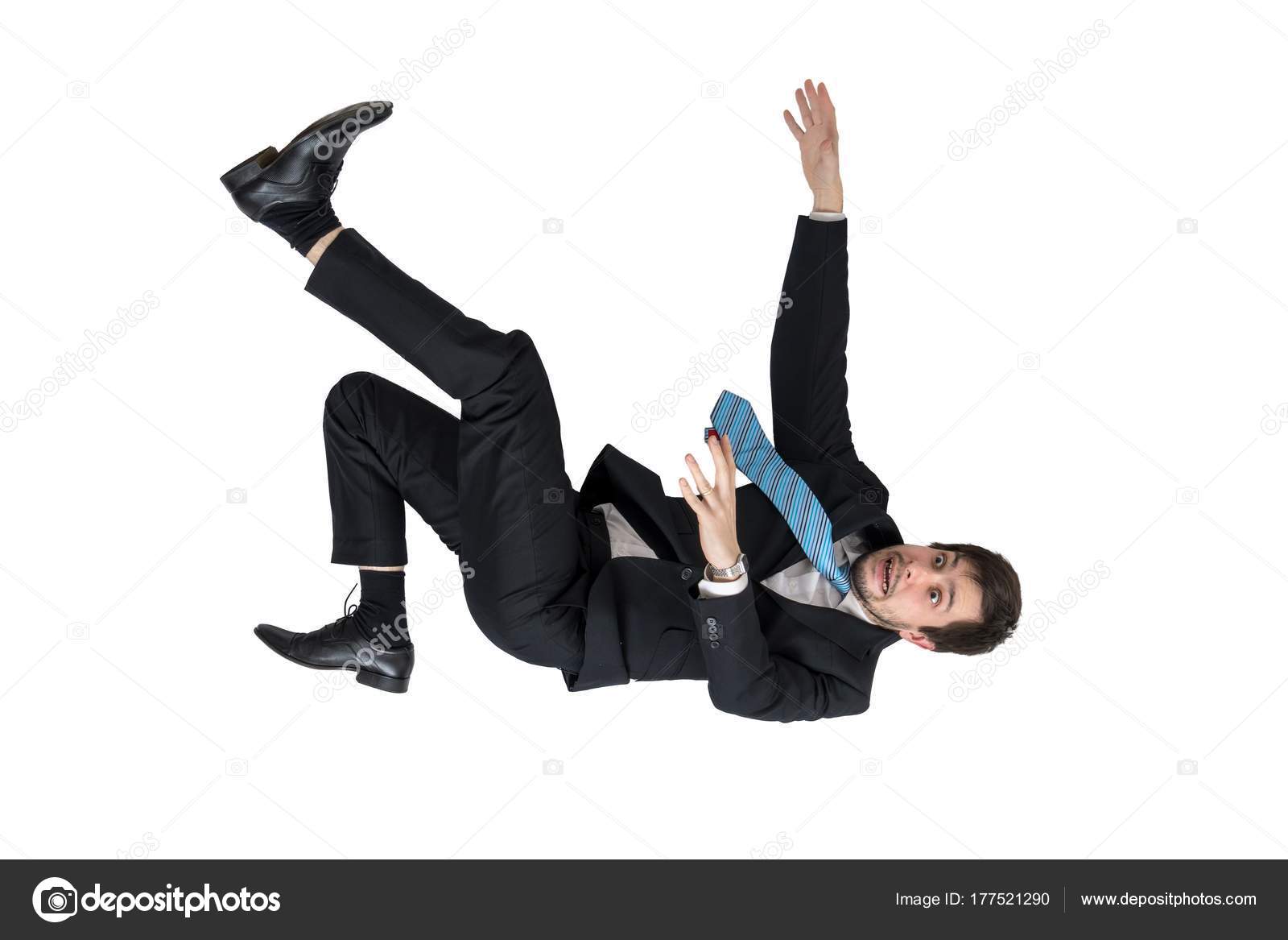 Businessman is falling down. Isolated on white background. Stock Photo ...