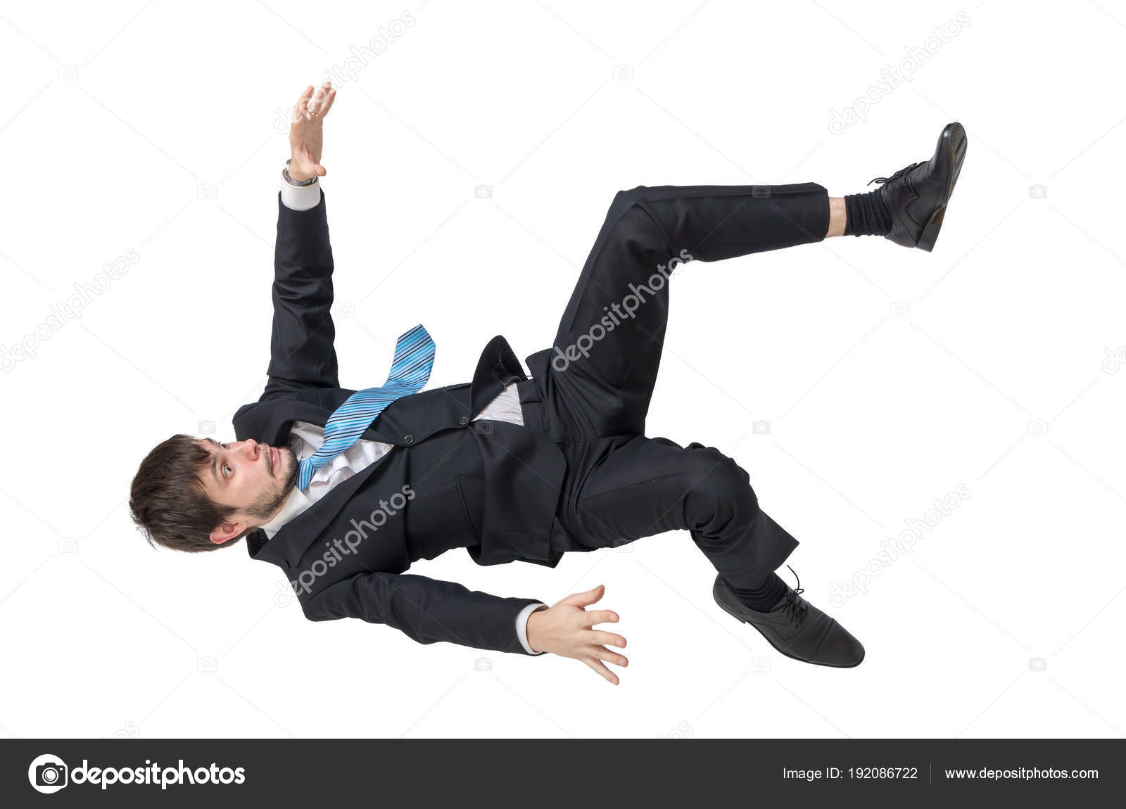 Businessman is falling down. Isolated on white background. Stock Photo ...