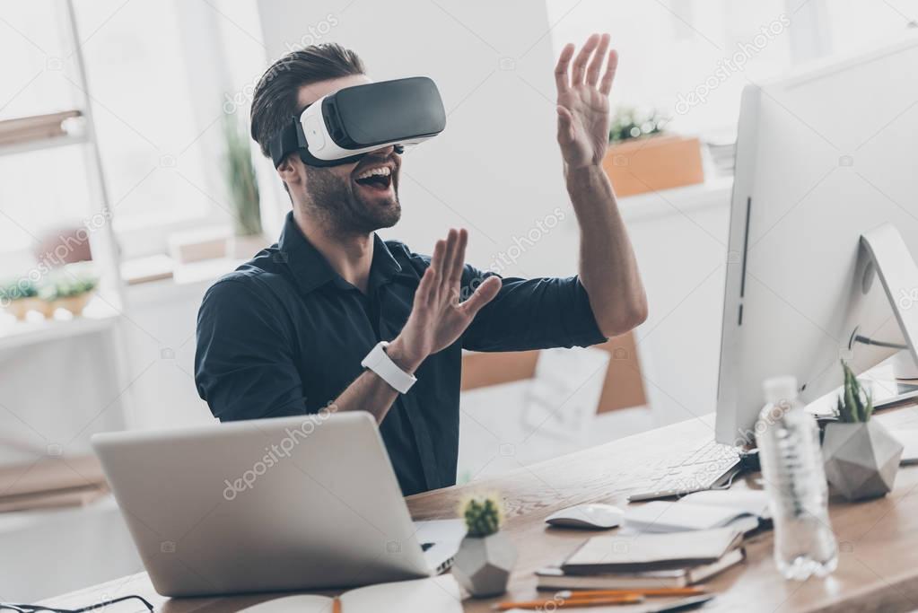 Handsome man in virtual reality — Stock Photo © gstockstudio #132279714