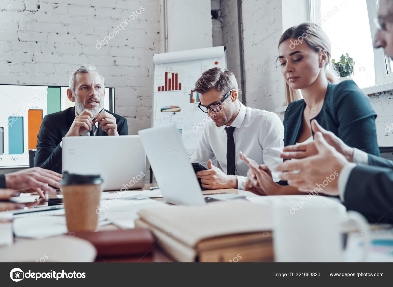 Successful Business Team Analyzing Strategy While Working Modern Office ...