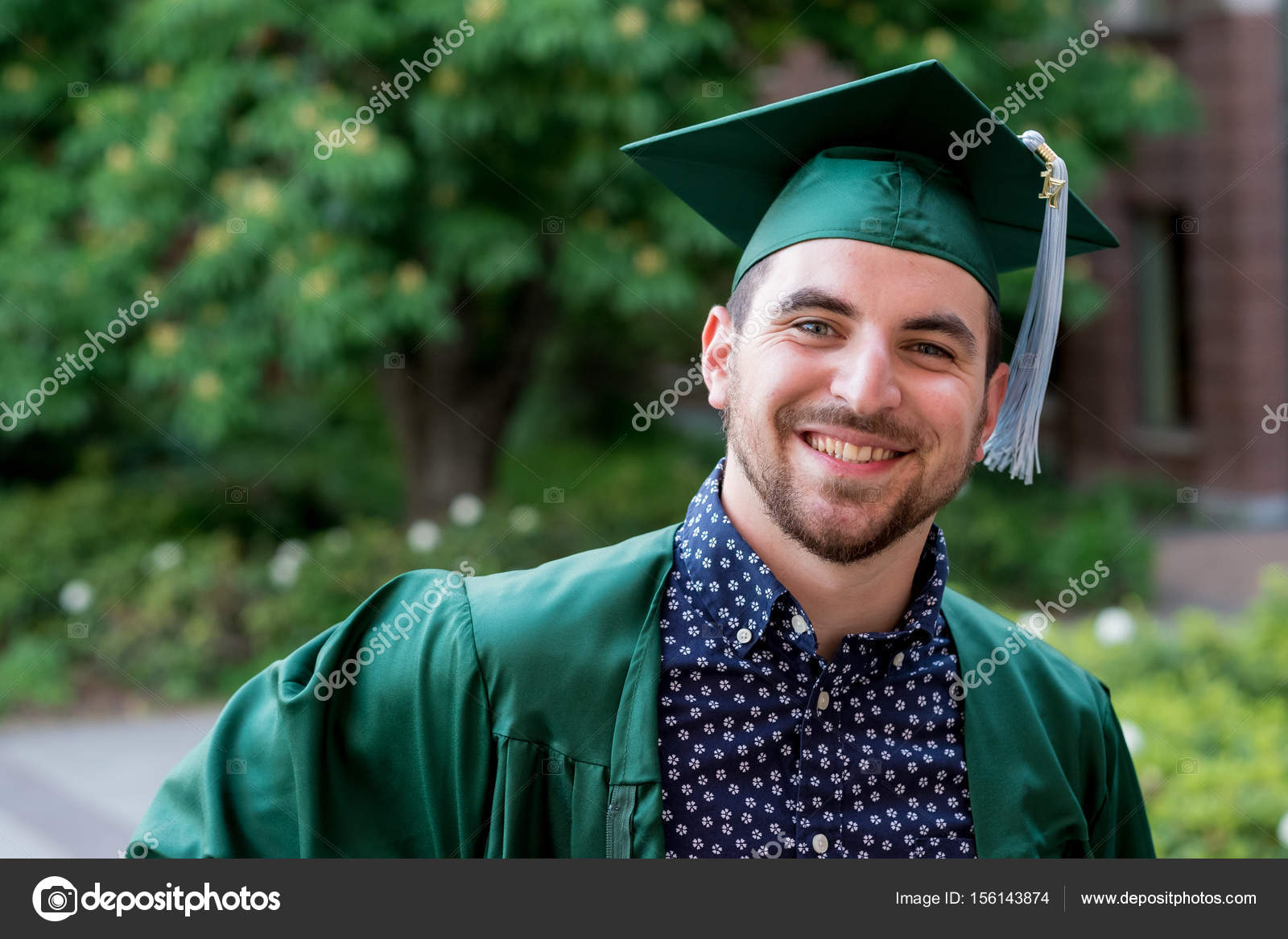 College Grad on Campus in Oregon — Stock Photo © joshuarainey #156143874